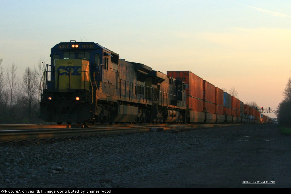 CSX Q164 with standard cab leader at sunset